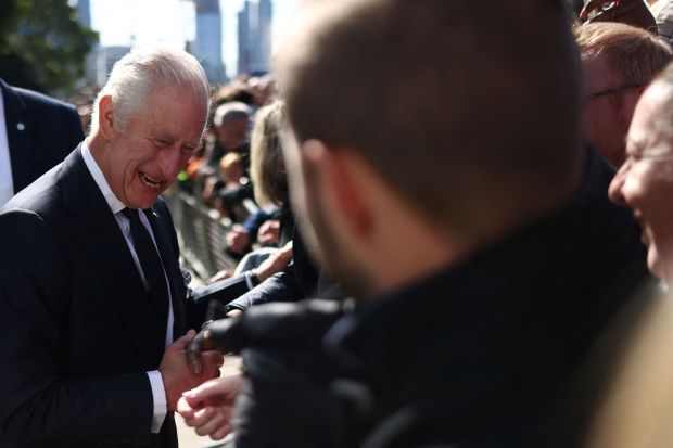 World News: King Charles shakes hands with well-wishers in queen's queue