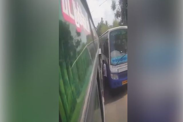 OMG: VIDEO: Man survives after getting stuck between two moving buses ...