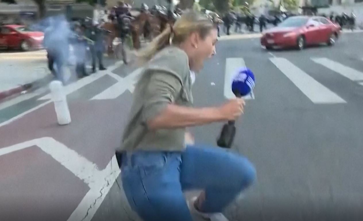 World News: VIDEO: TV journalist hit with rubber bullet during LA protests